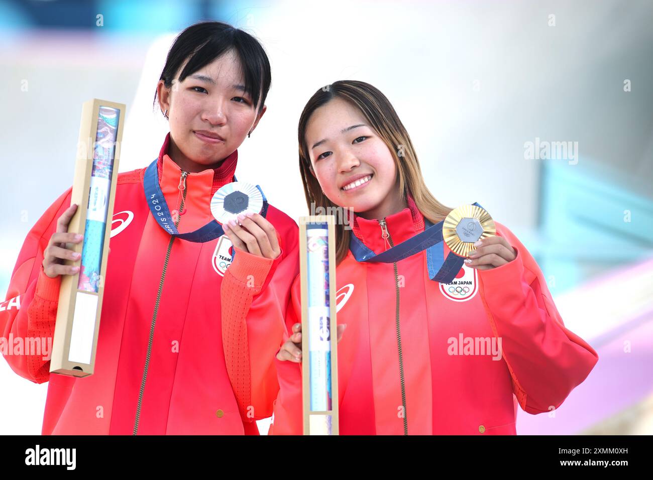 Liz AKAMA (L) and Coco YOSHIZAWA (R) of Japan display their Olympic ...
