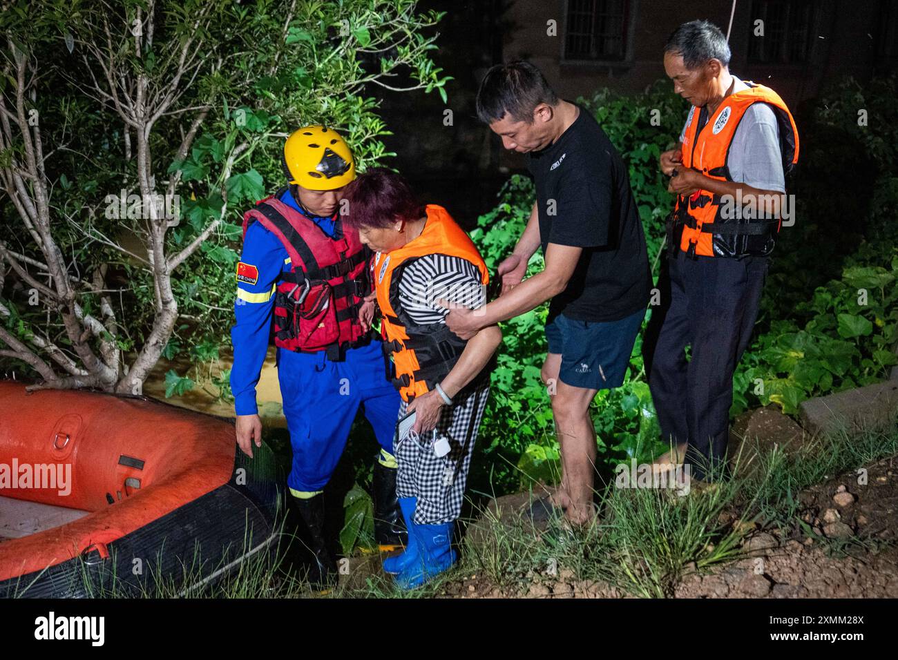 Changsha, China's Hunan Province. 29th July, 2024. Rescuers transfer ...
