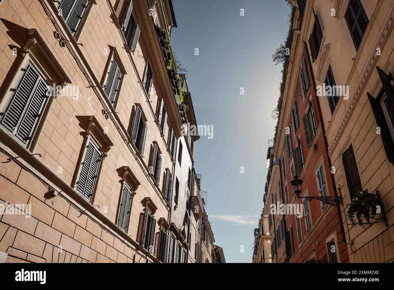 The image captures the facades of historic buildings in Rome, Italy ...