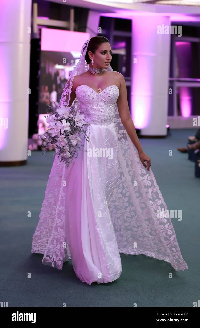 Colombo, Sri Lanka. 28th July, 2024. A model presents a bridal creation at the Designer Wedding ...