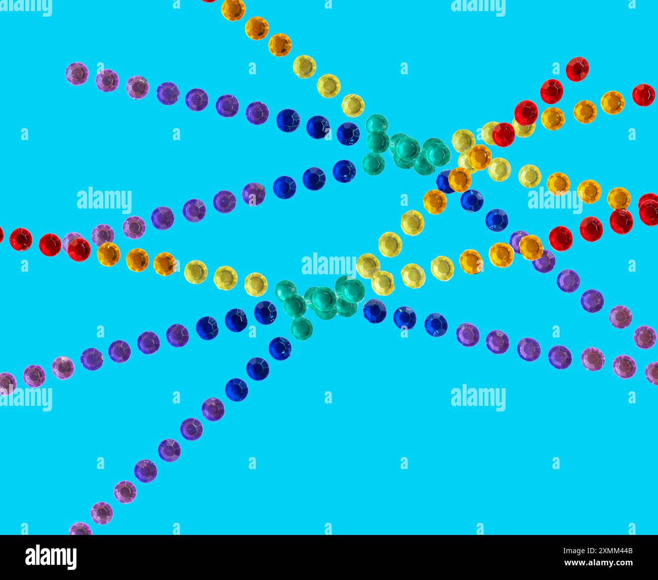 Isolated haphazard design of rhinestone gems jewels in long rows ...