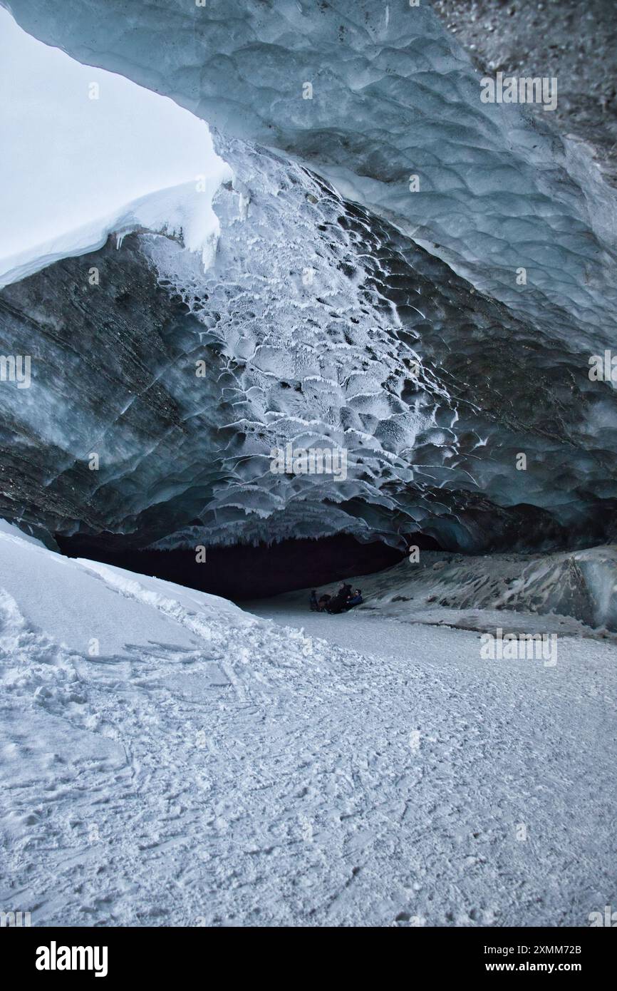 Ice at the entrance of Castner Cave, an ice cave in Alaska on a cold ...