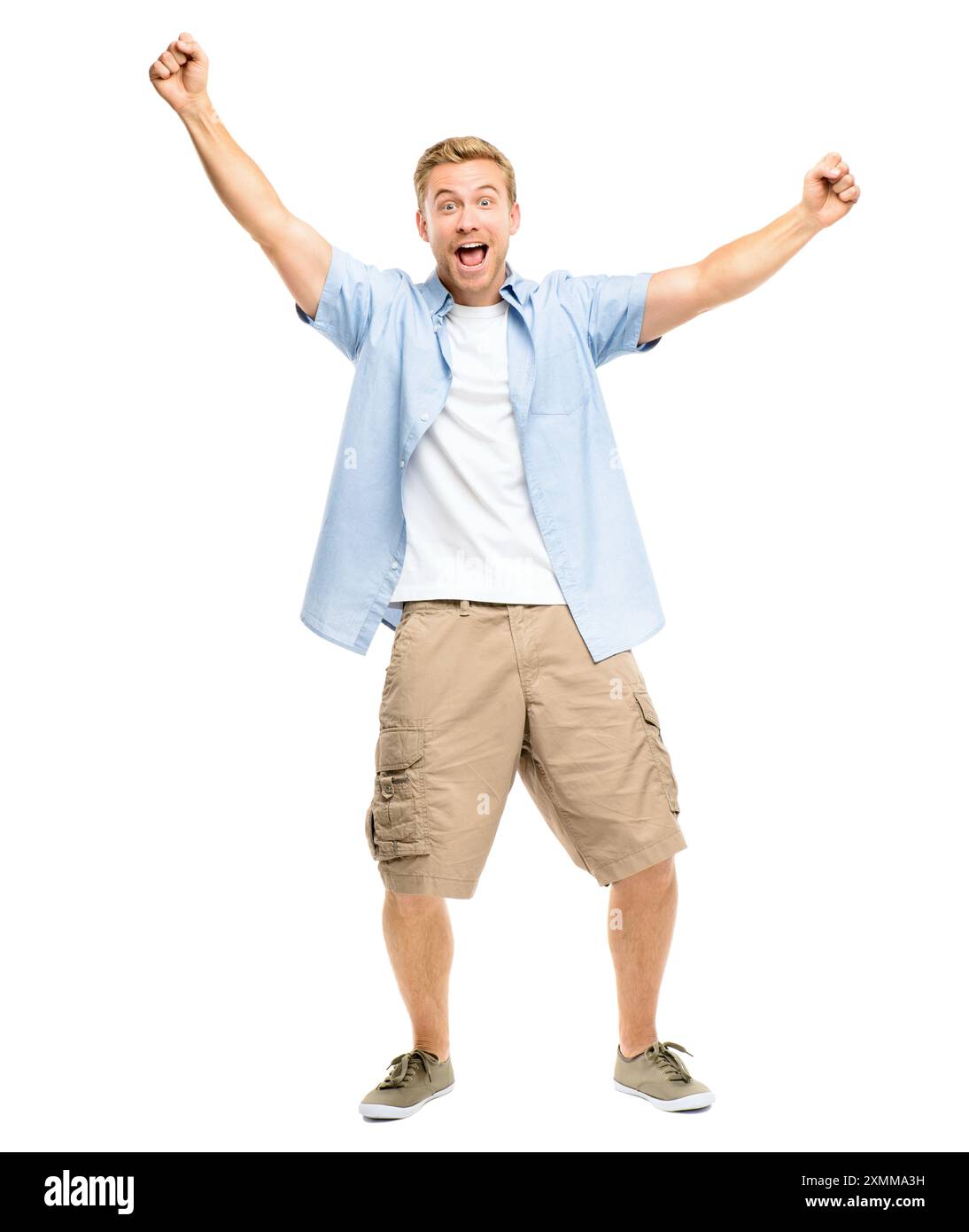 Man, portrait and celebration in studio with cheering for giveaway ...