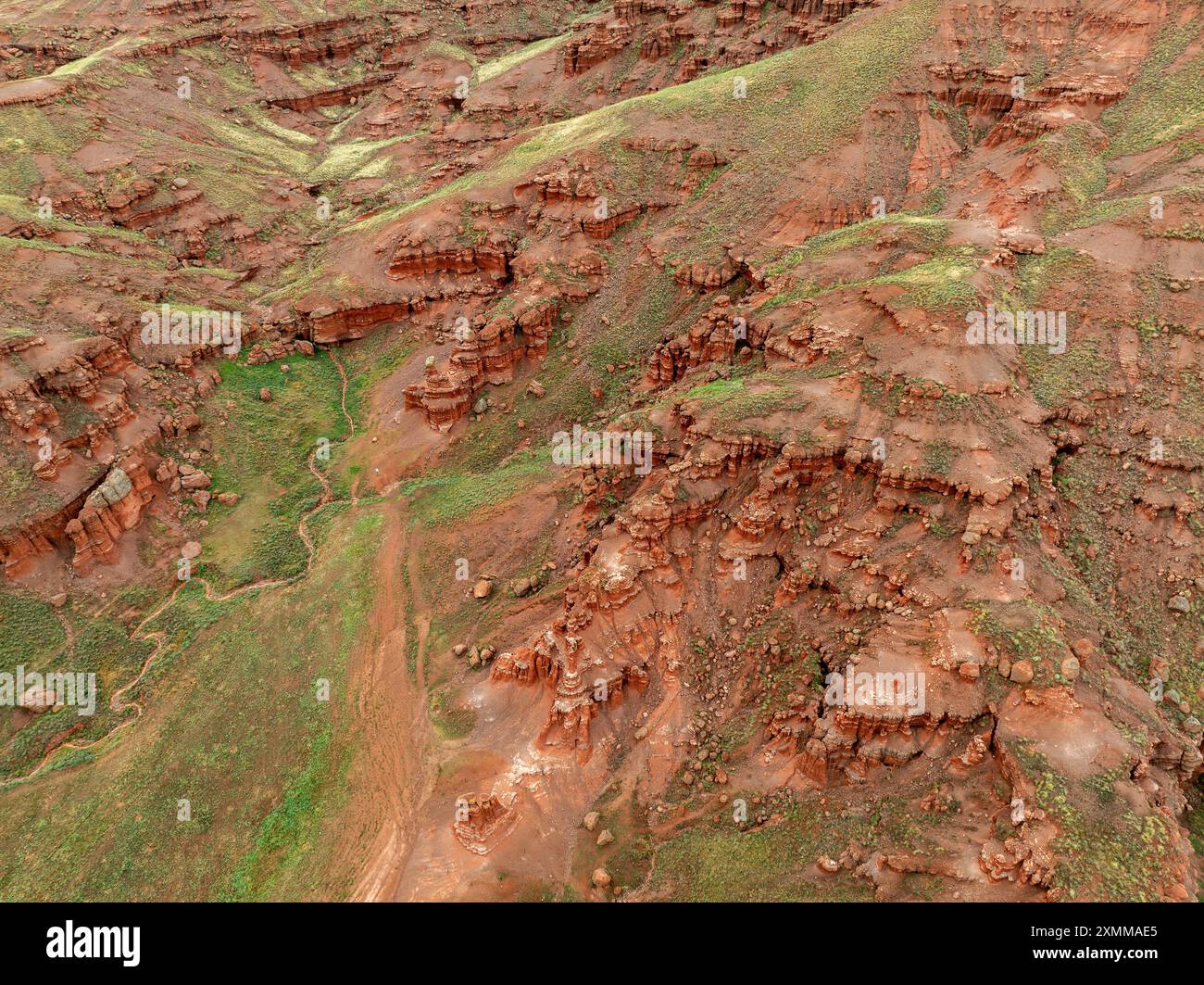 Red fairy chimneys shaped like formations that are millions of years ...
