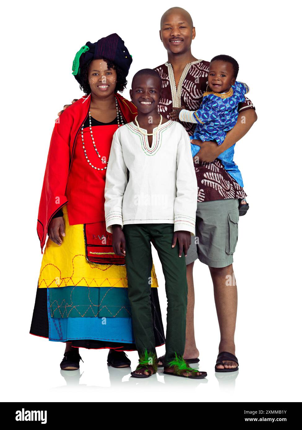 Traditional, portrait and African parents with children in studio with ...