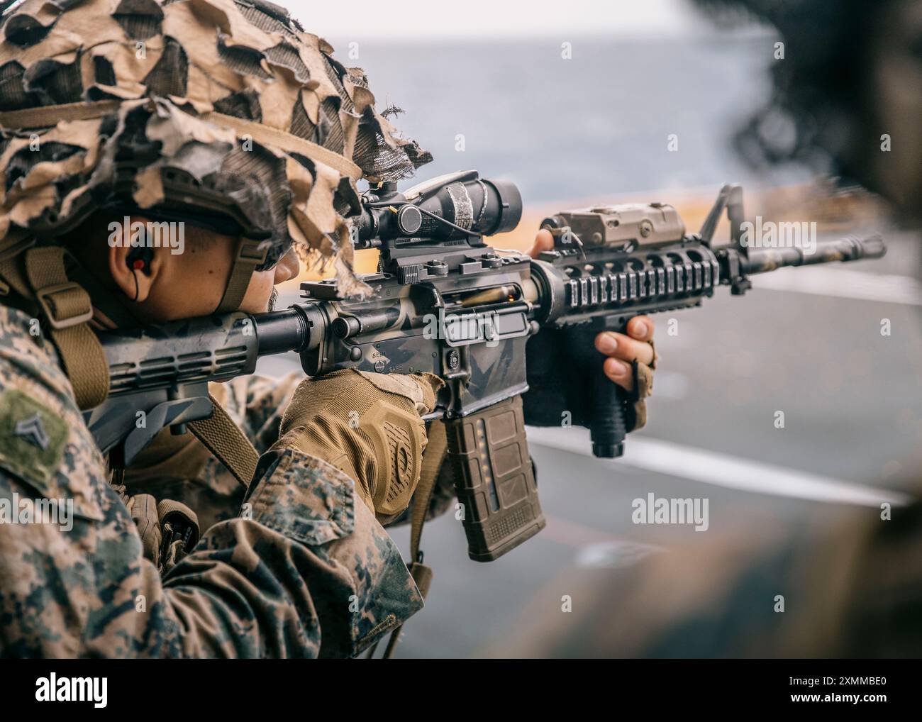 U.S. Marine Corps Cpl. Juan Cobos, the assistant sensors chief assigned ...