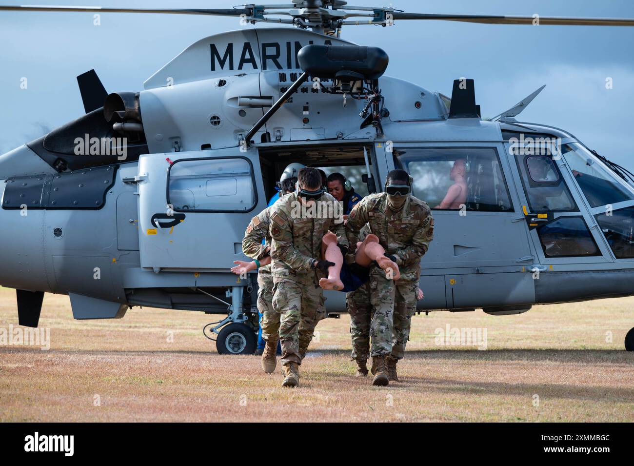 Citizen Airmen from the 624th Aeromedical Staging Squadron carry a ...