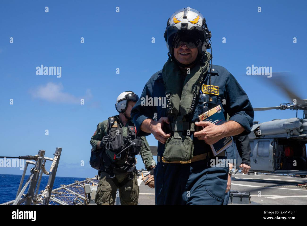 240726-N-FG645-1178 PACIFIC OCEAN (July 26, 2024) Capt. Matthew Foster ...