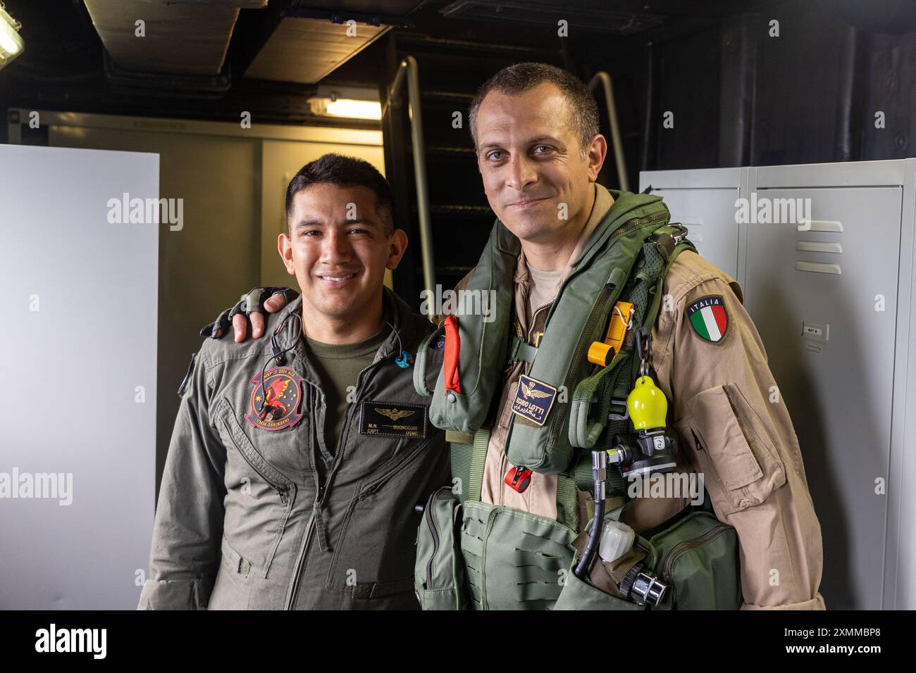 U.S. Marine Corps Capt. Michael Buonocore, left, an aircraft commander ...
