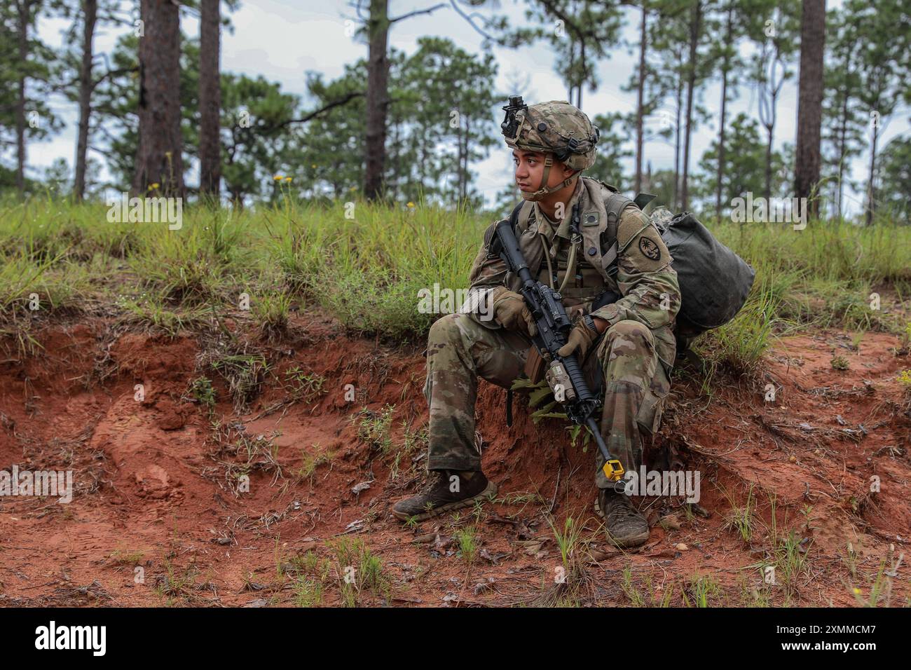 A Soldier from the Guam Army National Guard, conduct a tactical foot ...