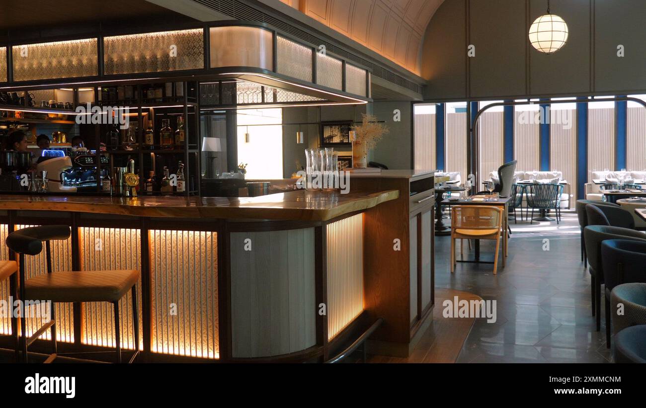 Modern interior of cozy bar with stylish furniture and warm lighting ...