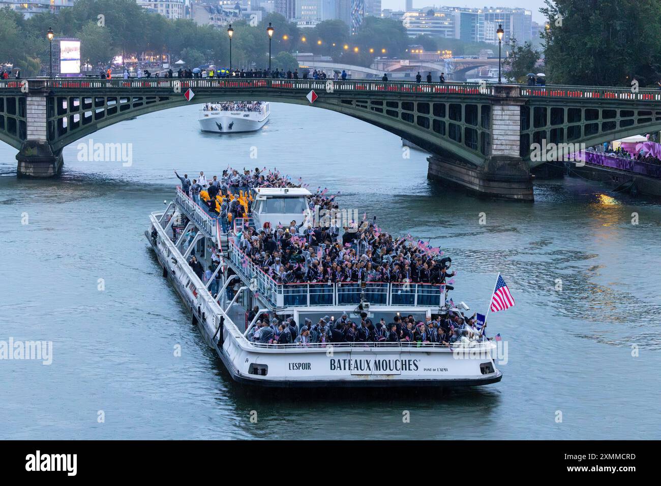 The U.S. Olympic Team waves to onlookers during the opening ceremonies ...