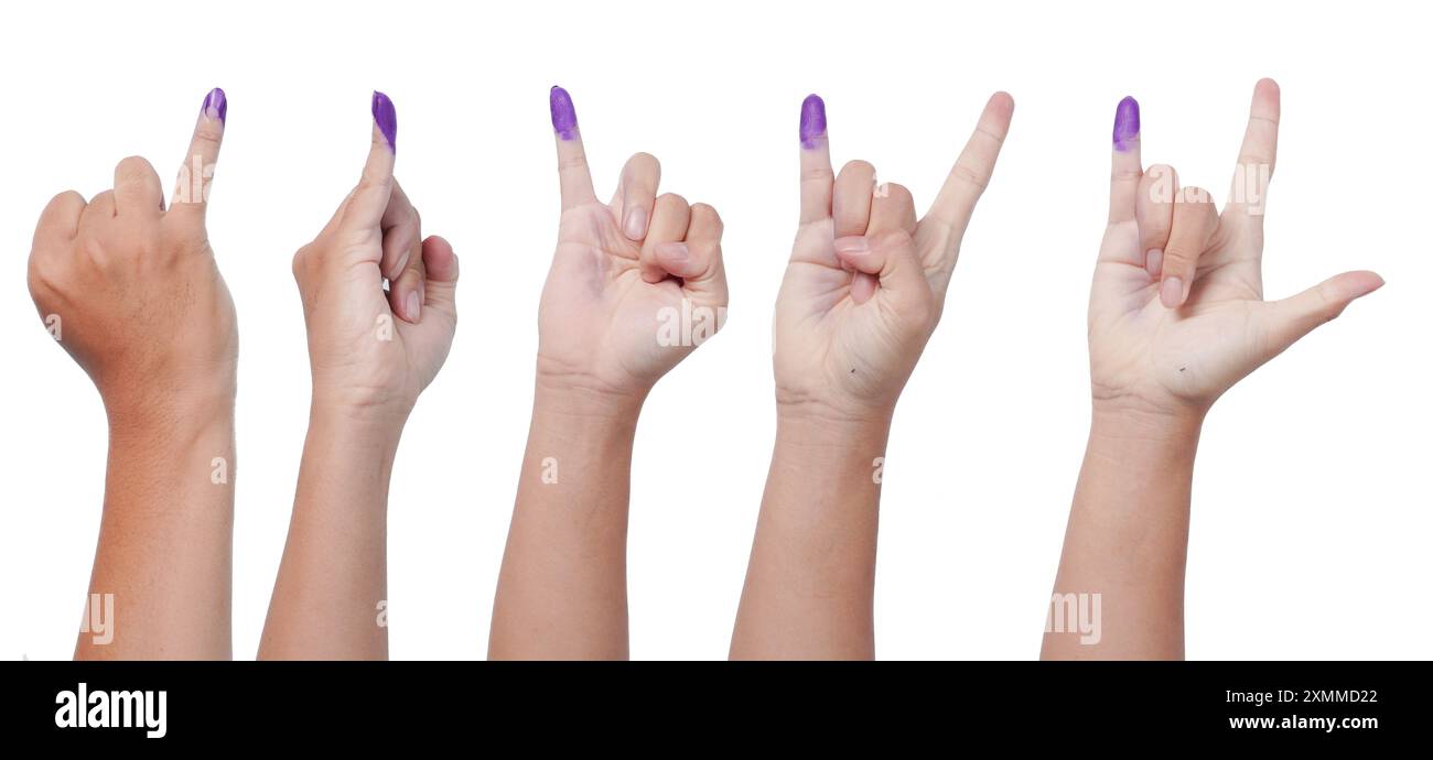 Group of hand showing little finger dipped in purple ink after voting ...