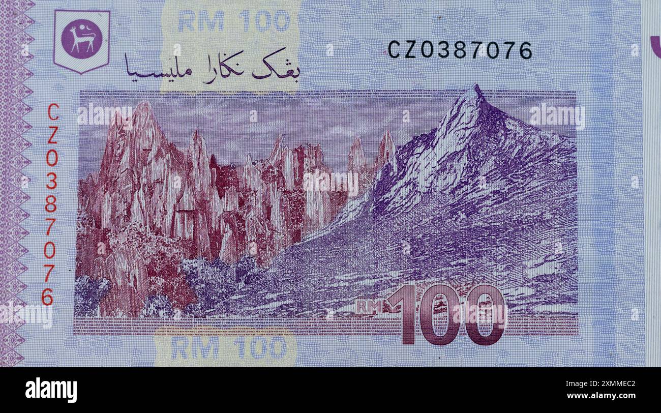 RM100 banknote on the back side of the 100 Ringgit bill are rock formations of Gunung Api Valley ...