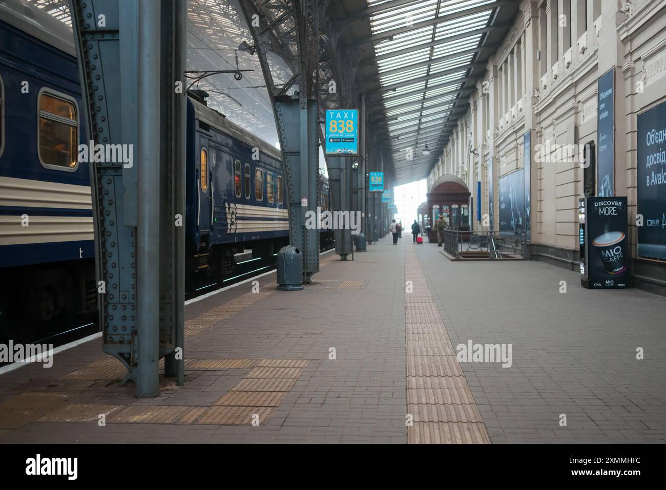 Lviv, Ukraine - March 25, 2024: Covered platform and standing passenger ...