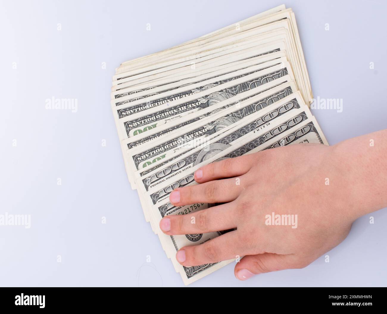 Human hand holding American dollar bill as money isolated on white ...