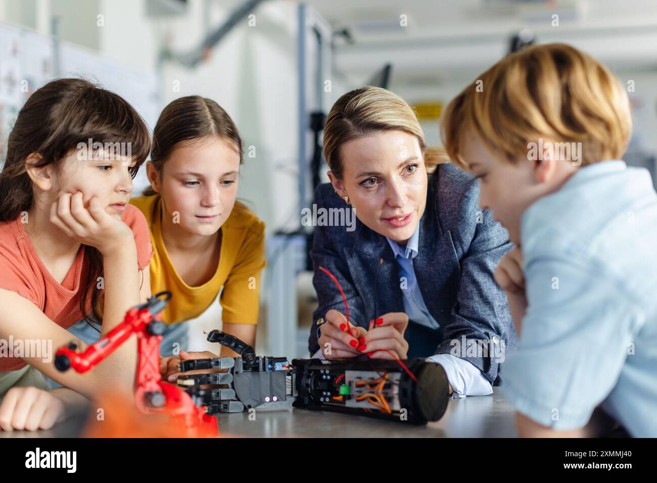 Children learning robotics in Elementary school. Young students ...