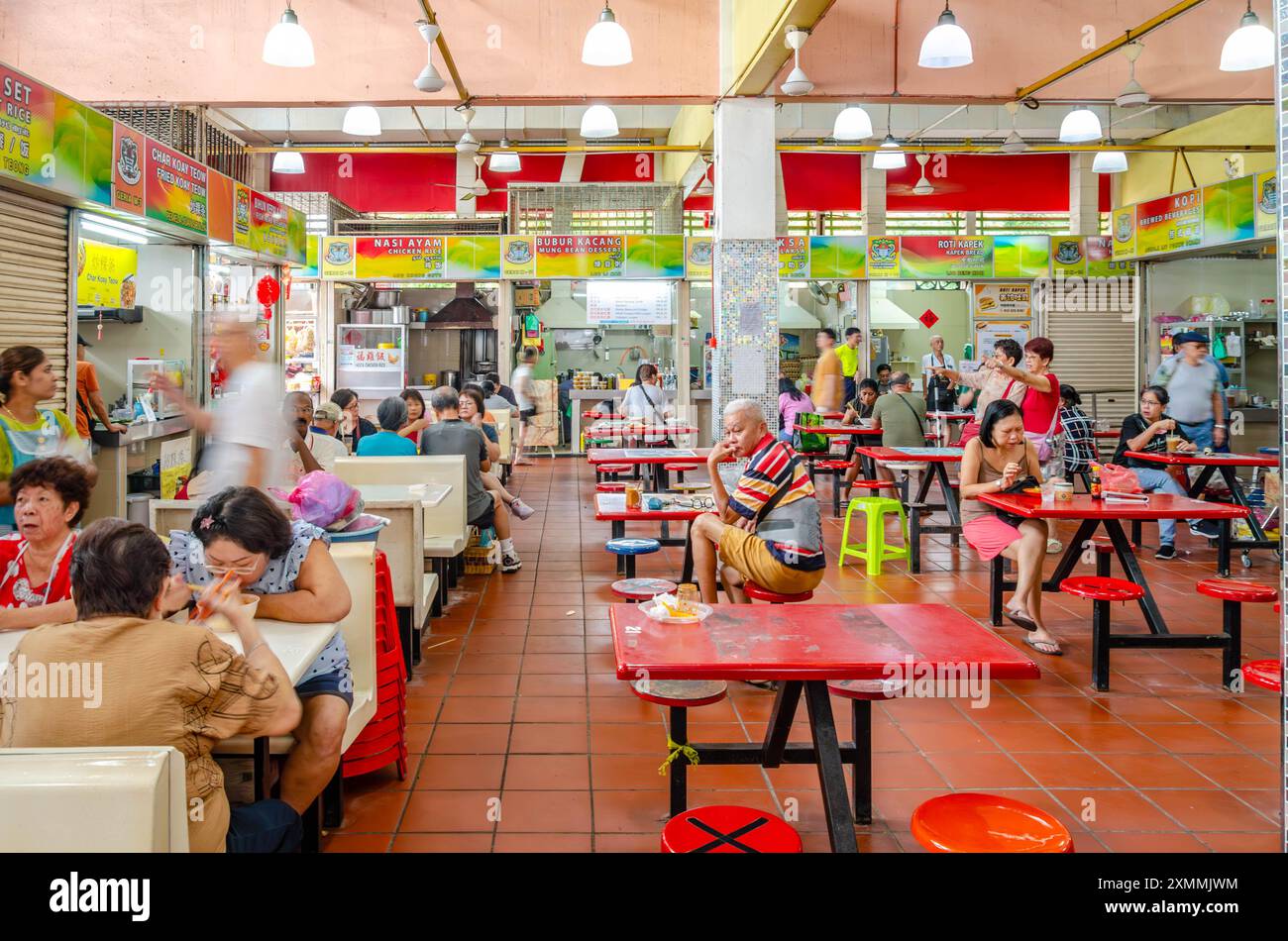 People eating breakfast at the food court in Tanjung Bungah Market in ...