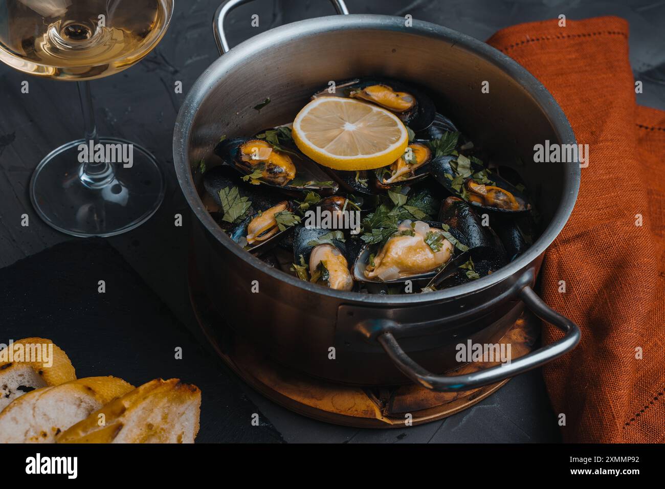 Mussels cooked according to a traditional Italian recipe in a sauce of ...