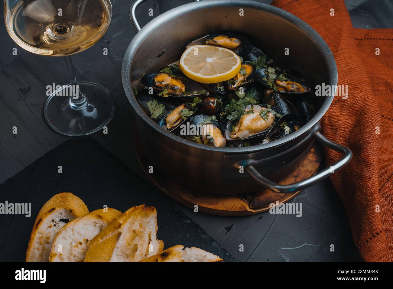 Mussels cooked according to a traditional Italian recipe in a sauce of ...