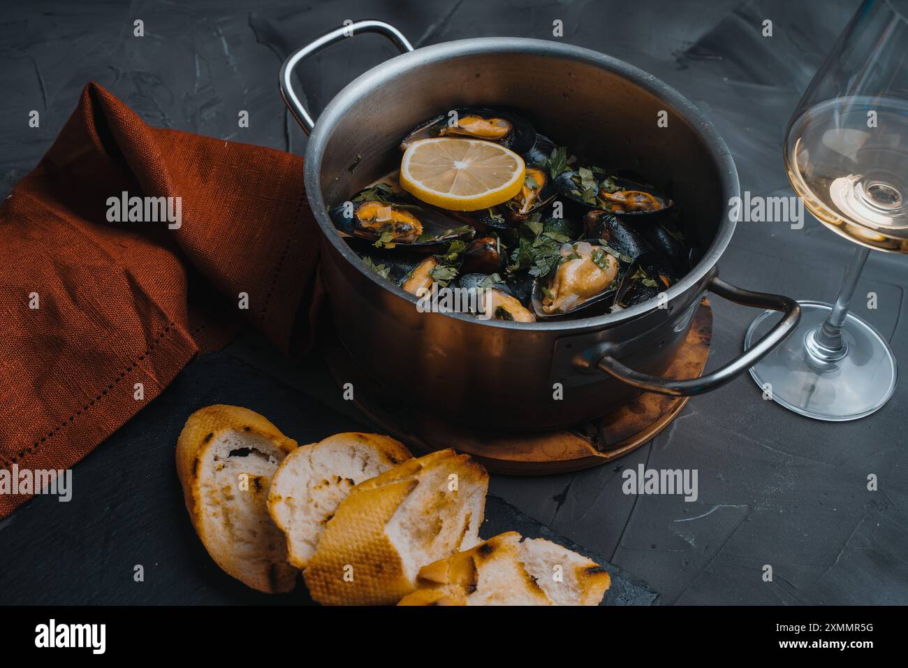 Mussels cooked according to a traditional Italian recipe in a sauce of ...