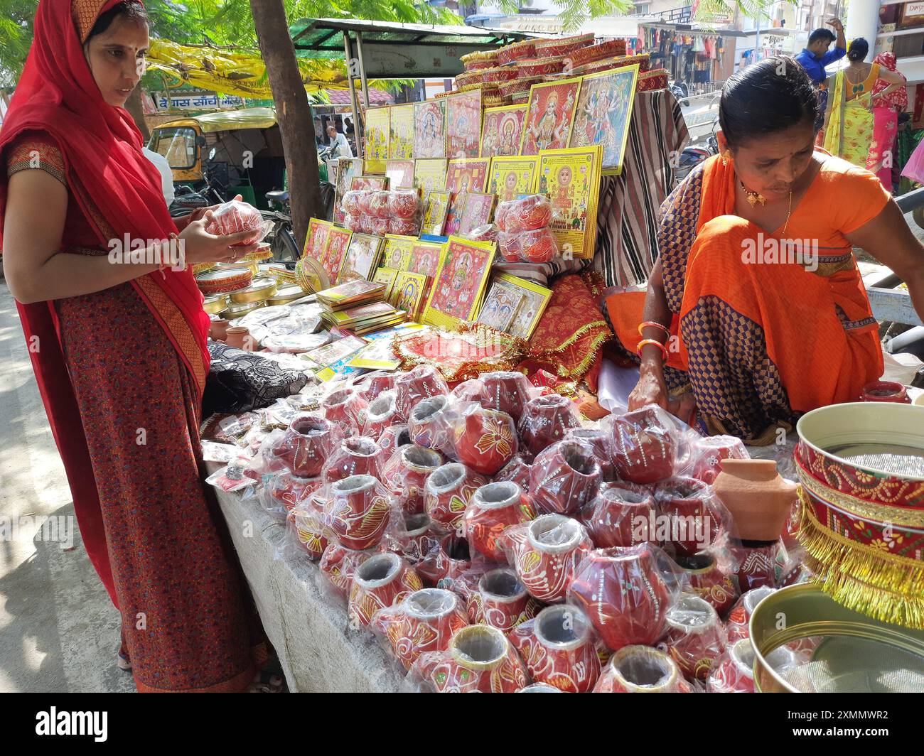 21 October 2021 Dewas, Madhya Pradesh, India. An Indian woman selling ...