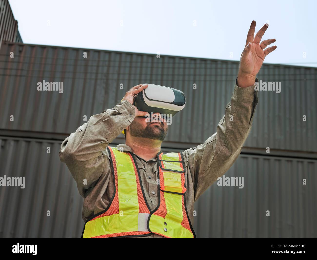 Engineer Wearing An Augmented Reality Headset And Using Gestures To Control Objects In Augmented