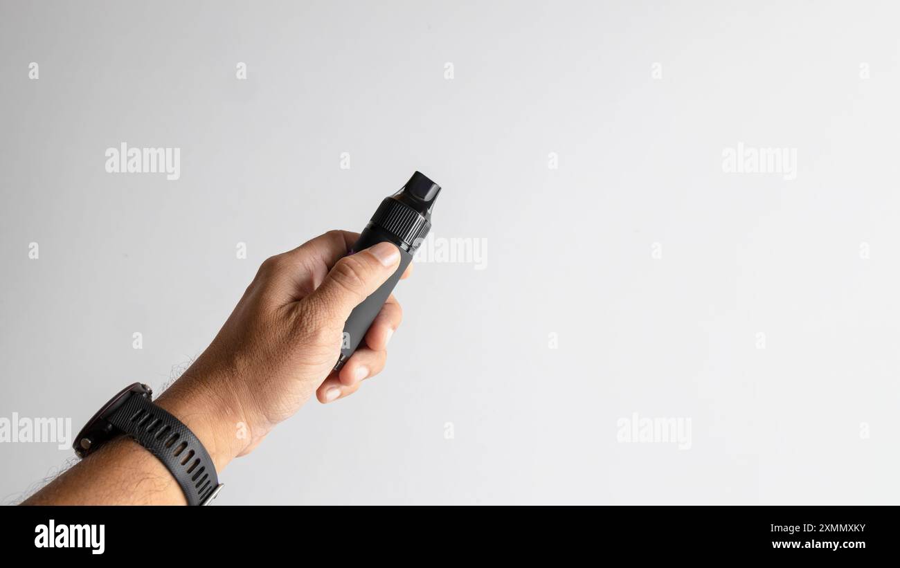 Hand Holding Black Vape Device. Pod Kits, Pod Mods, Pod Vapes ...