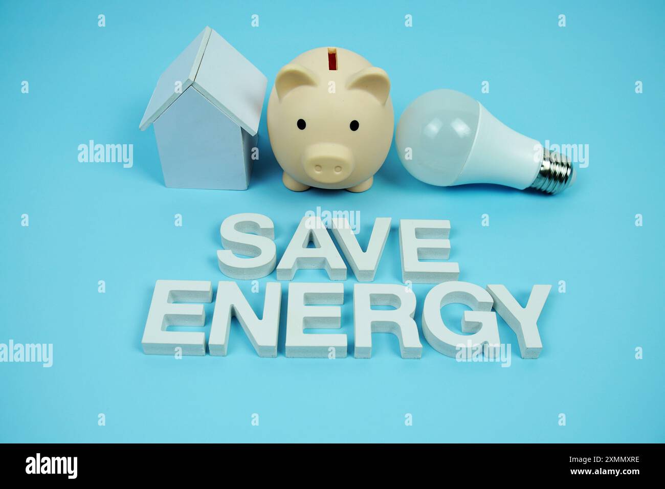 Save Energy alphabet letters with house model, piggy bank and LED light ...