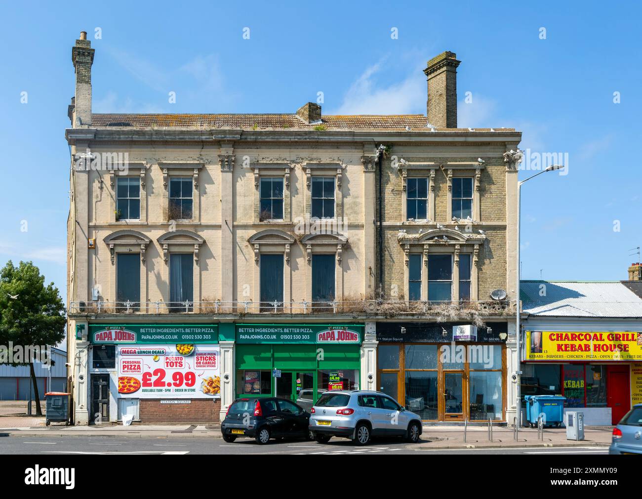 Fast food takeaways row of three empty buildings in town centre ...