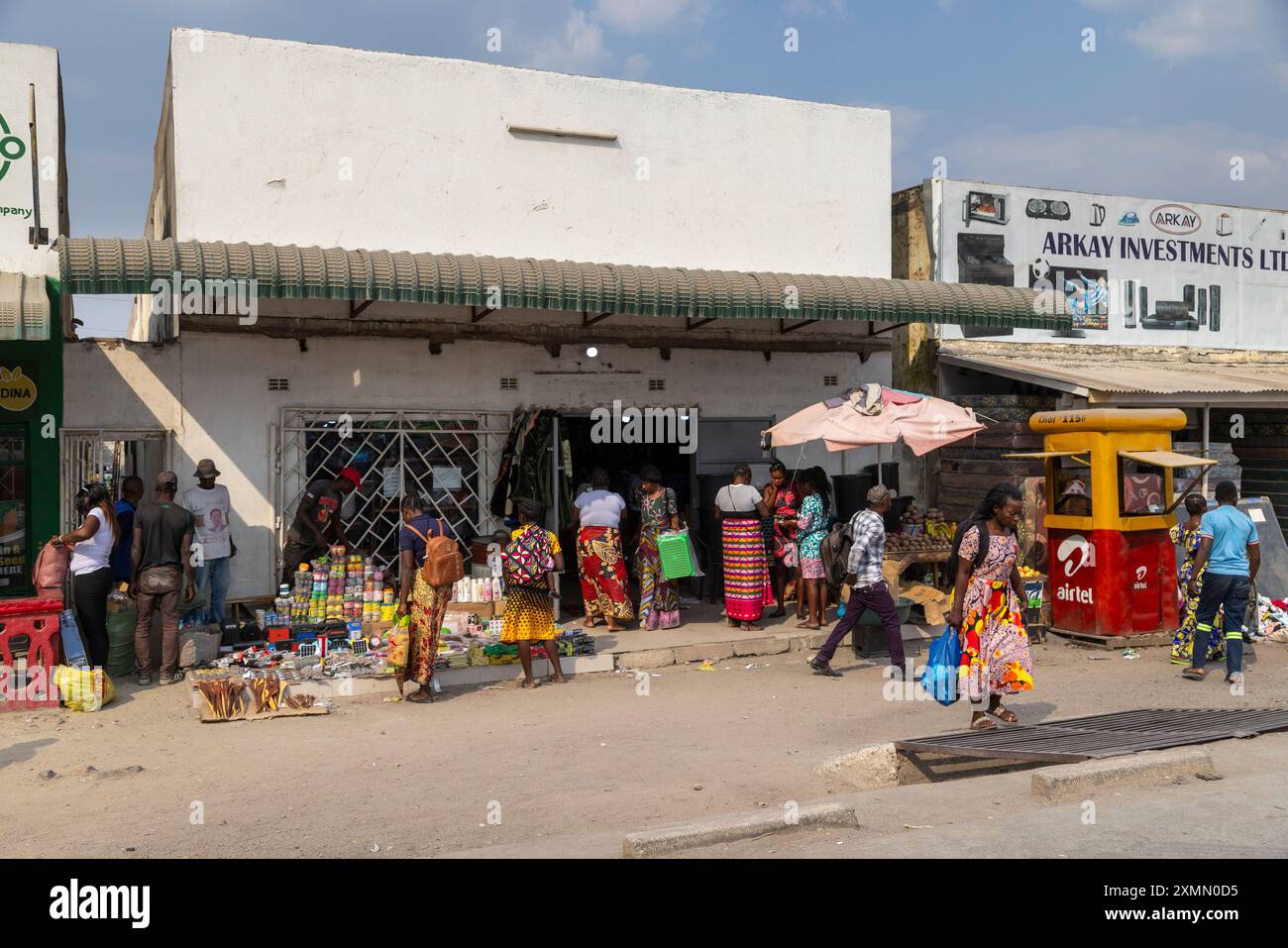 Street scene showing shoppers in Kabwe at a store selling everyday ...