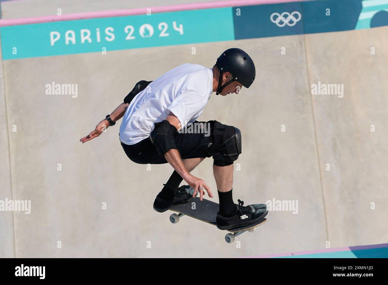 Tony Hawk skates at La Concorde Urban Park before play resumes during ...