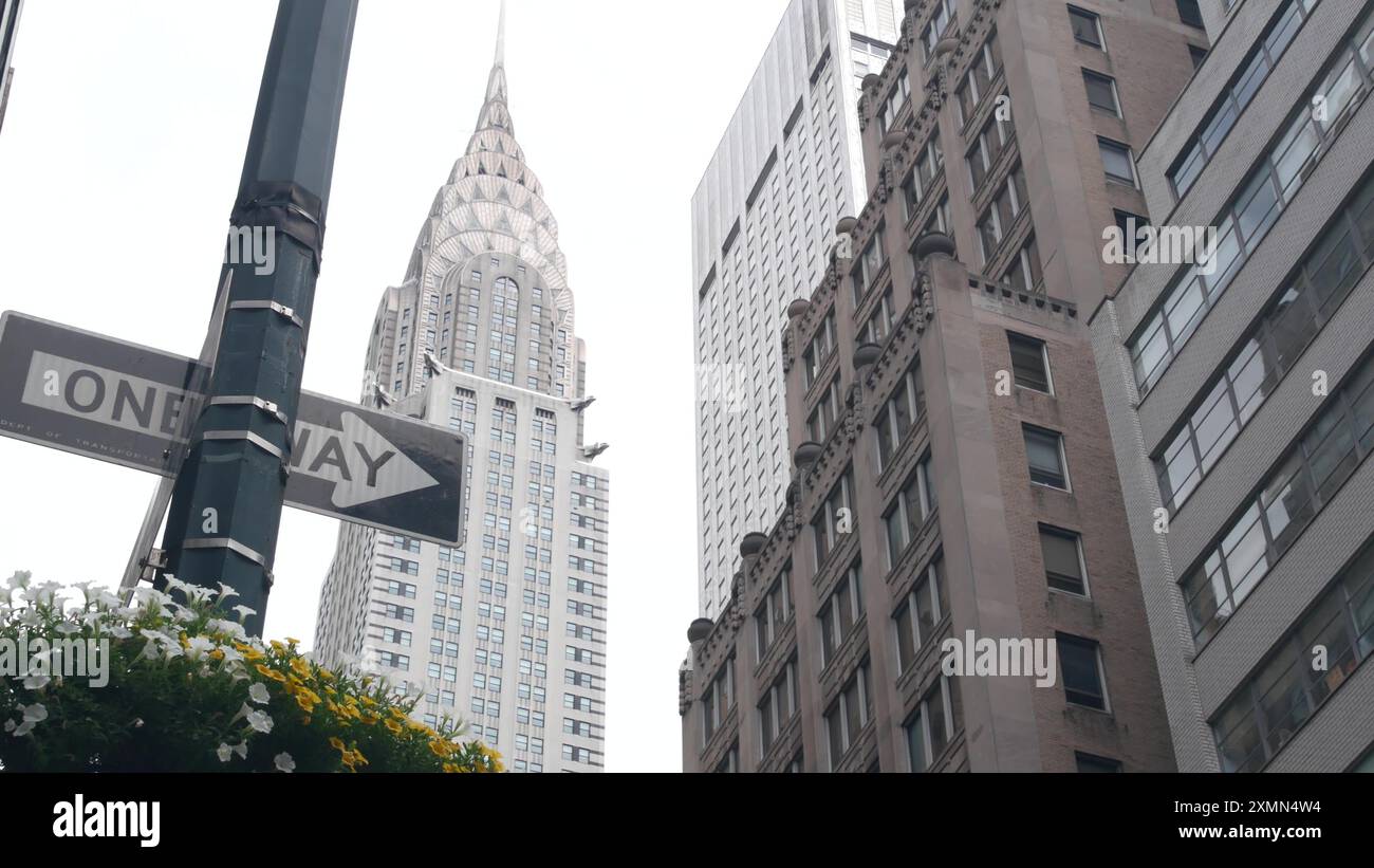 New York City crossroad, street intersection road sign post. Chrysler ...