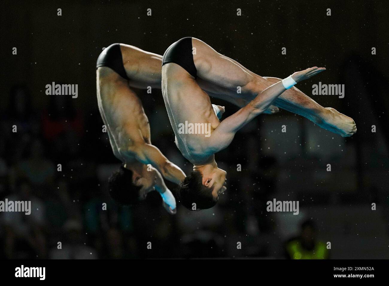 China's Lian Junjie and Yang Hao compete in the men's 10-meter ...