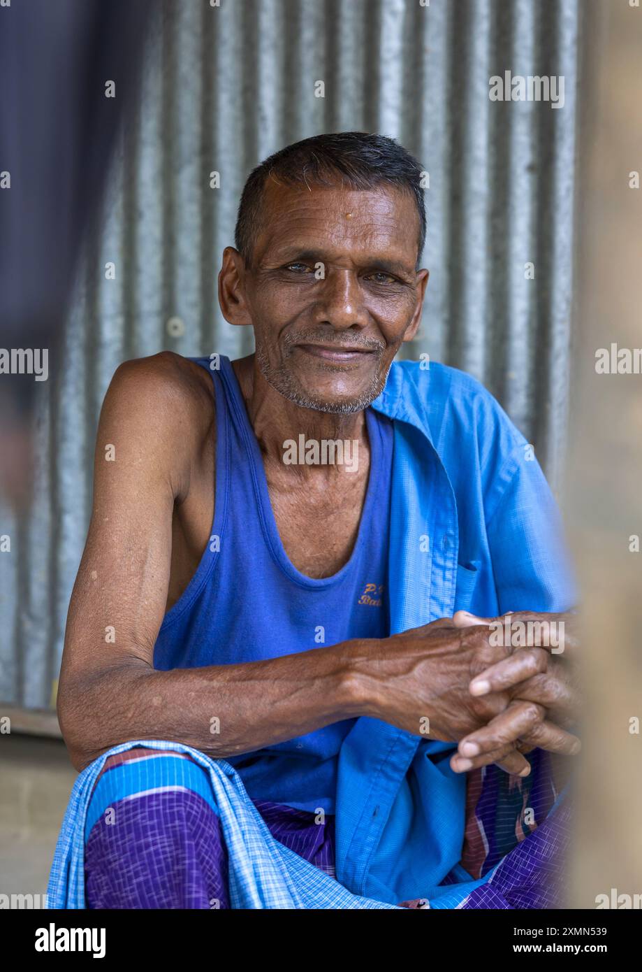 Portrait of a bangladeshi man dressed in blue, Khulna Division, Narail ...