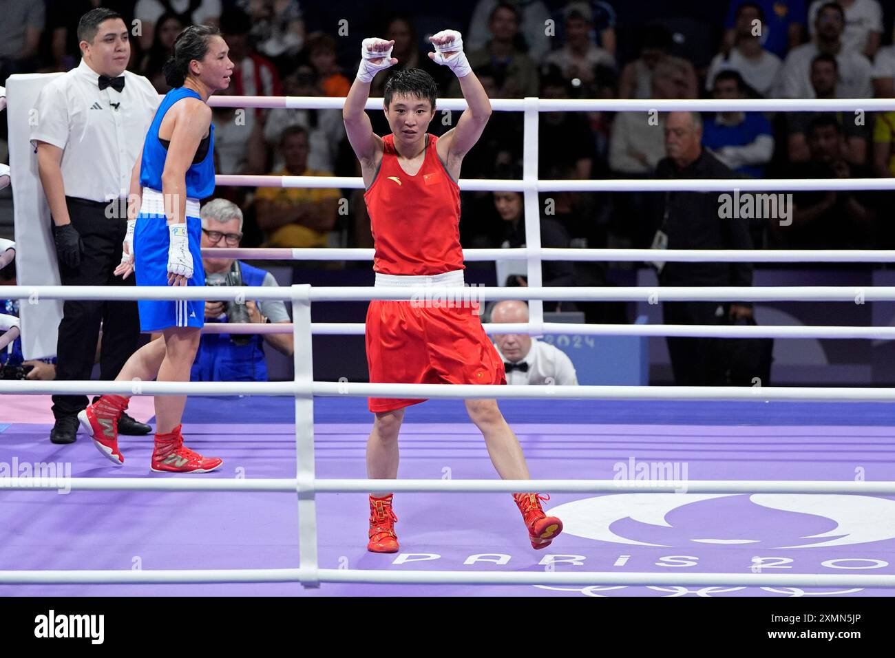 China's Yang Wenlu celebrates after defeating Vietnam's Thi Linh Ha in ...