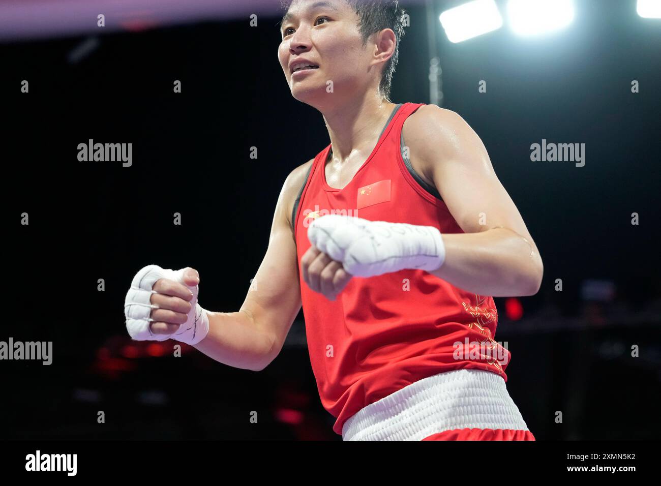 China's Yang Wenlu celebrates after defeating Vietnam's Thi Linh Ha in ...