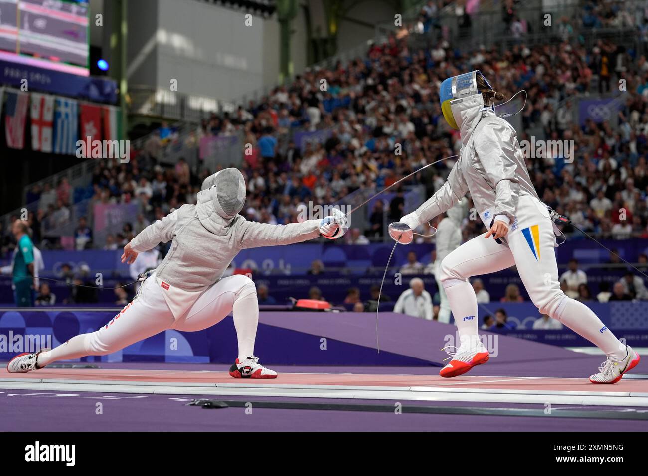 South Korea's Jeon Hayoung, left, and Ukraine's Alina Komashchuk ...