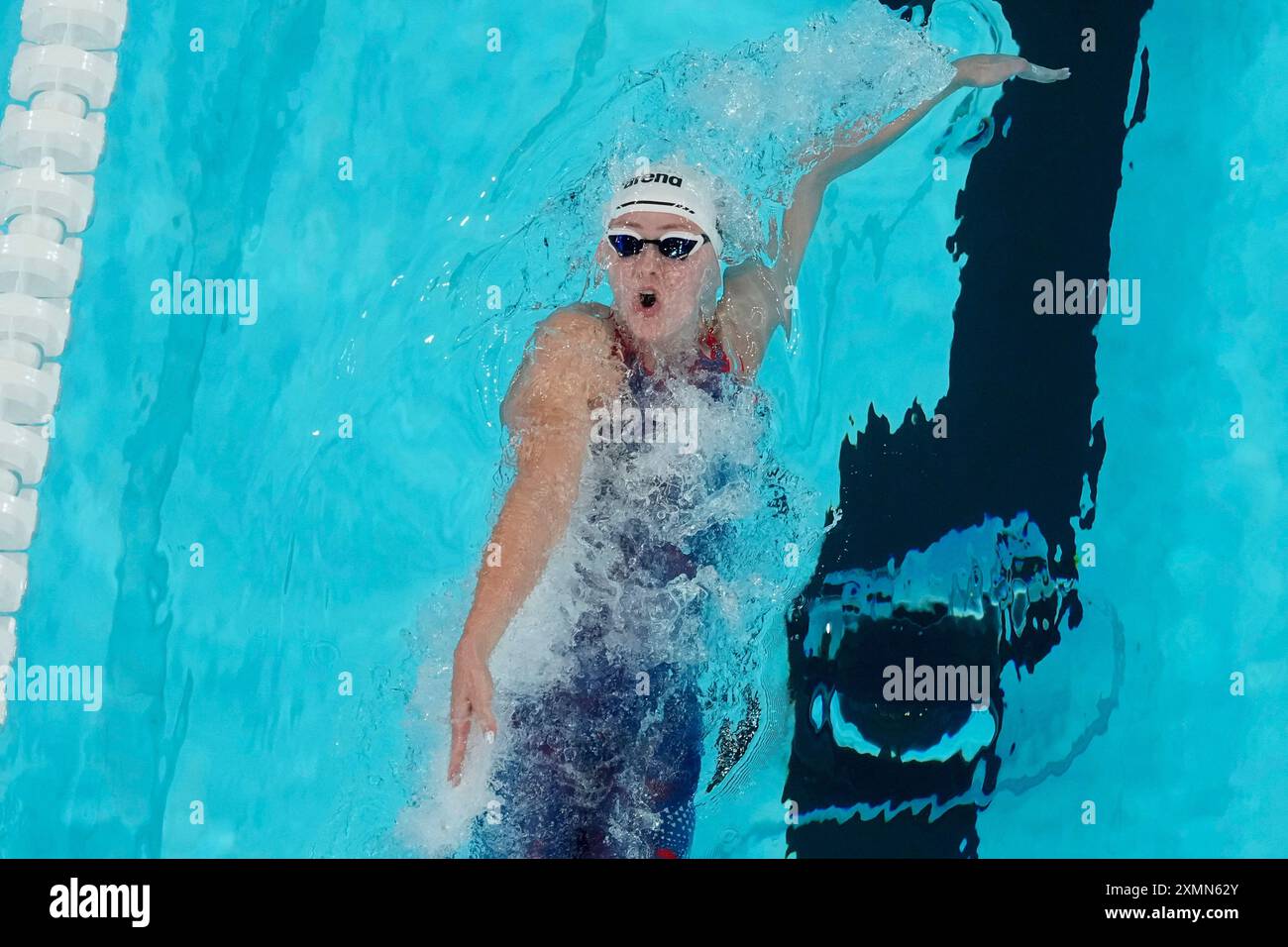 Katharine Berkoff, of the United States, competes during a heat in the ...