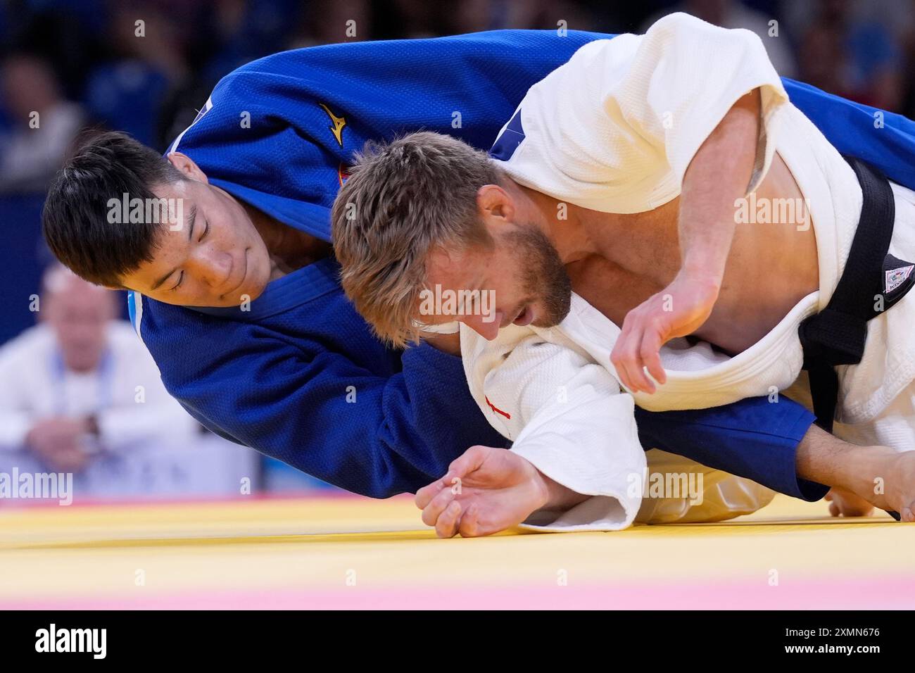 Switzerland's Nils Stump, right, and Mongolia's Erdenebayar Batzaya ...