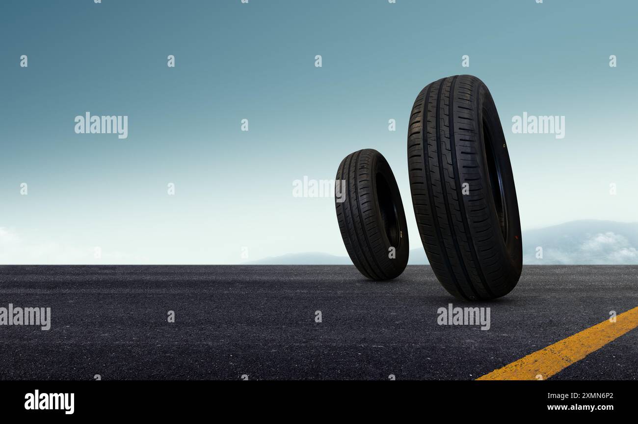 Stack of Tires on an Empty Road with Blue Sky Background Stock Photo ...