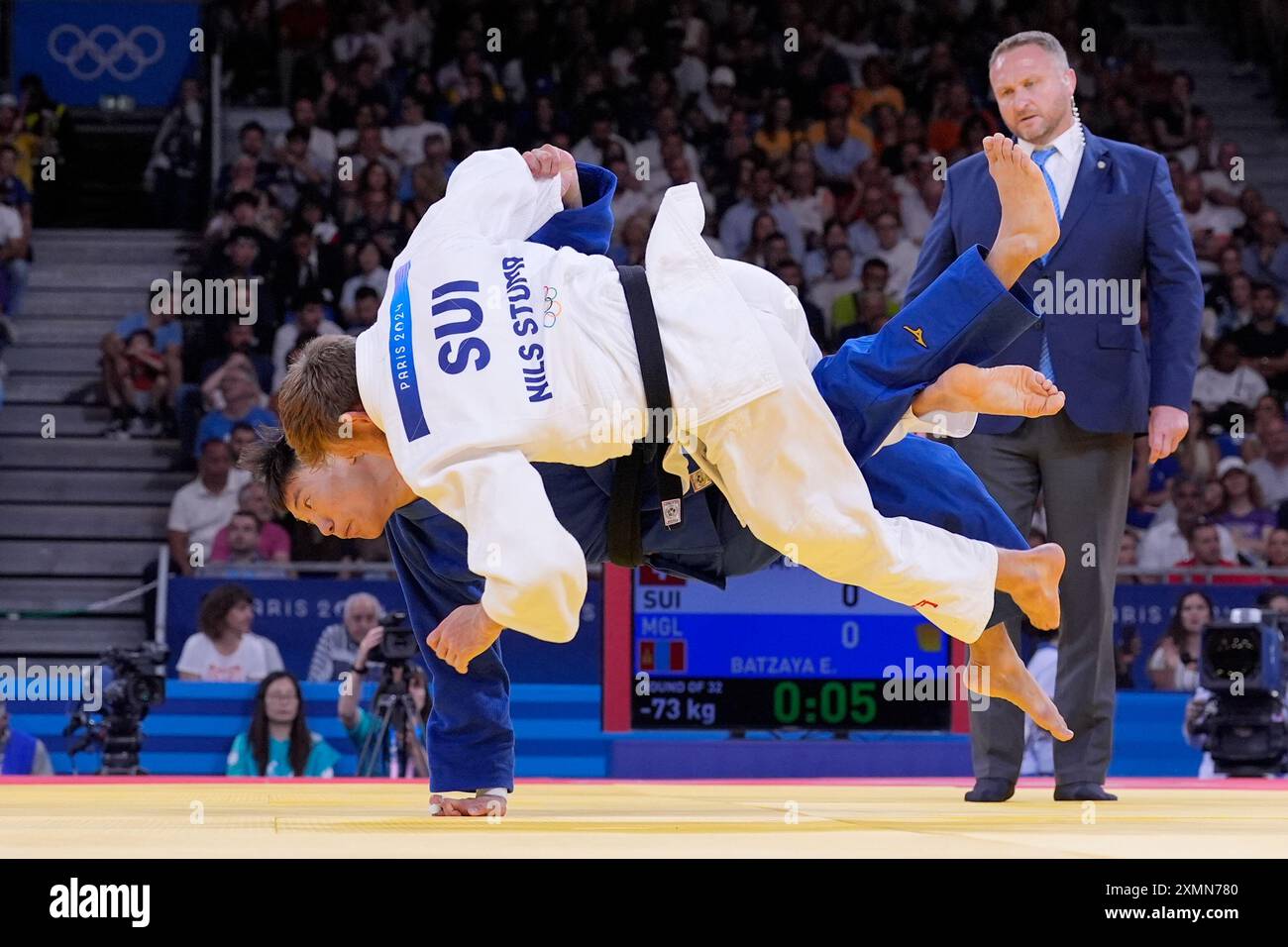 Switzerland's Nils Stump and Mongolia's Erdenebayar Batzaya compete ...