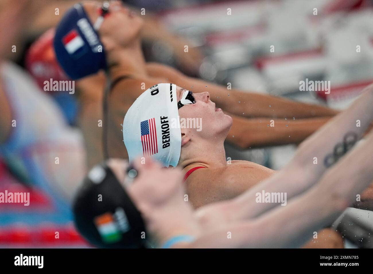 Katharine Berkoff, of the United States, competes during a heat in the ...