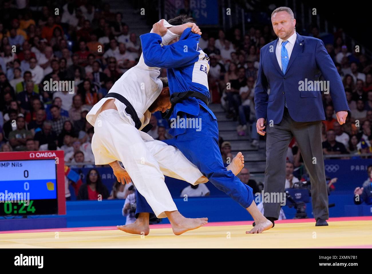 Switzerland's Nils Stump and Mongolia's Erdenebayar Batzaya compete ...
