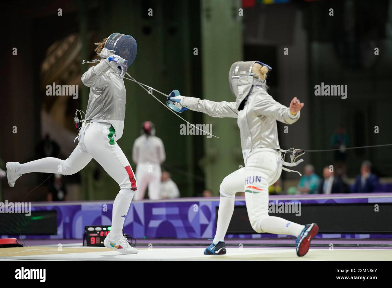 Italy's Michela Battiston, left, and Hungary's Liza Pusztai compete in ...