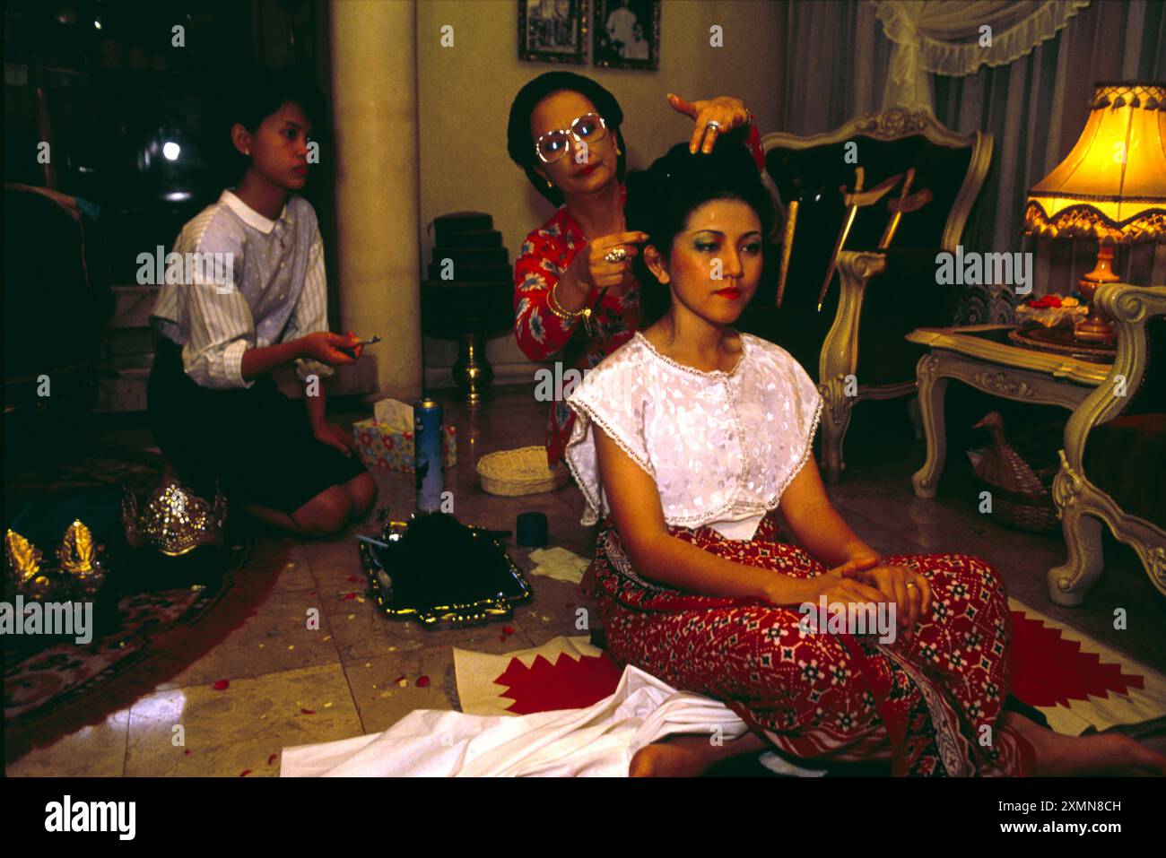 Preparation of bride, Indonesia Stock Photo - Alamy