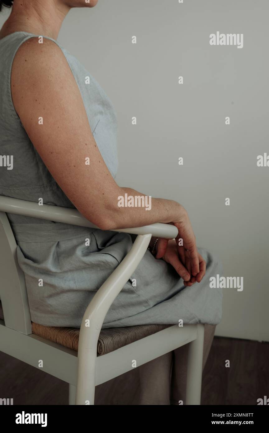 Sitting seated posture hi-res stock photography and images - Alamy