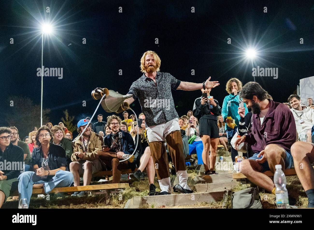 Director Ryland Brickson Cole Tews, center, introduces his film ...