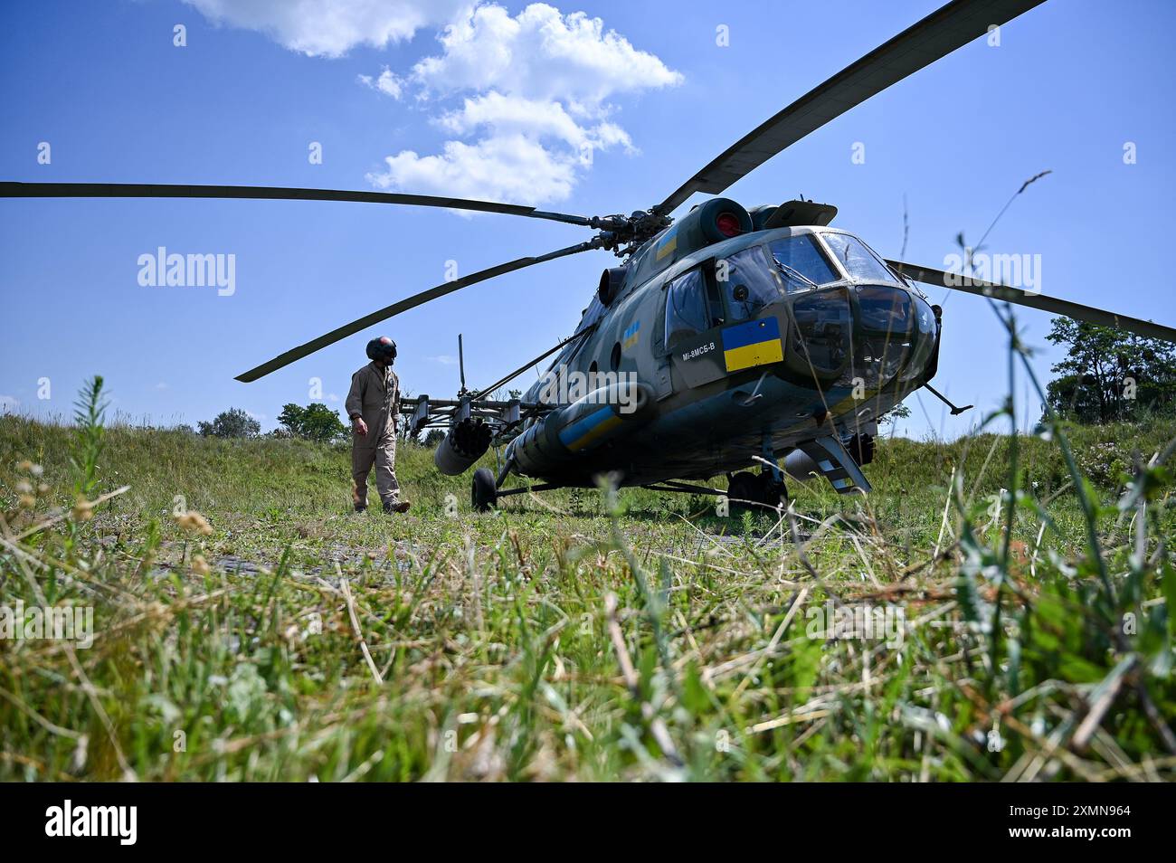 UKRAINE - JULY 11, 2024 - A flight engineer checks the systems of a Mi ...