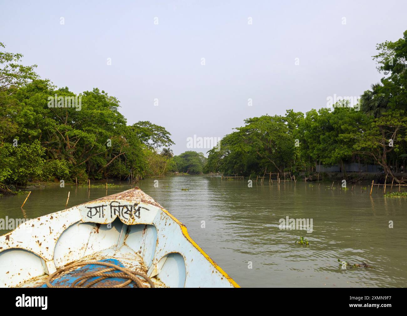 Boat on a river in the Sundarbans, Barisal Division, Banaripara ...